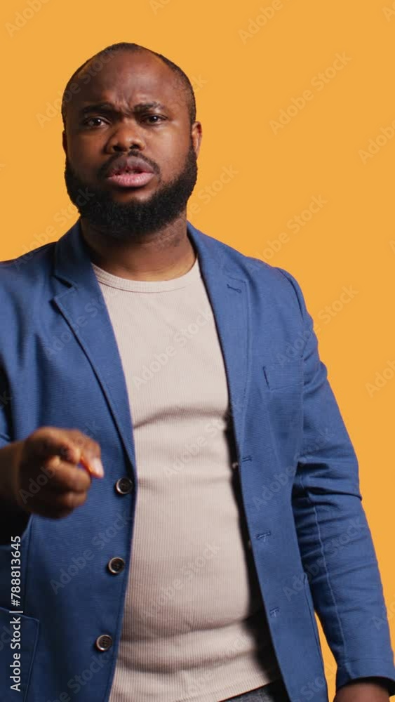 Vertical video Angry african american man fighting with friend over ...