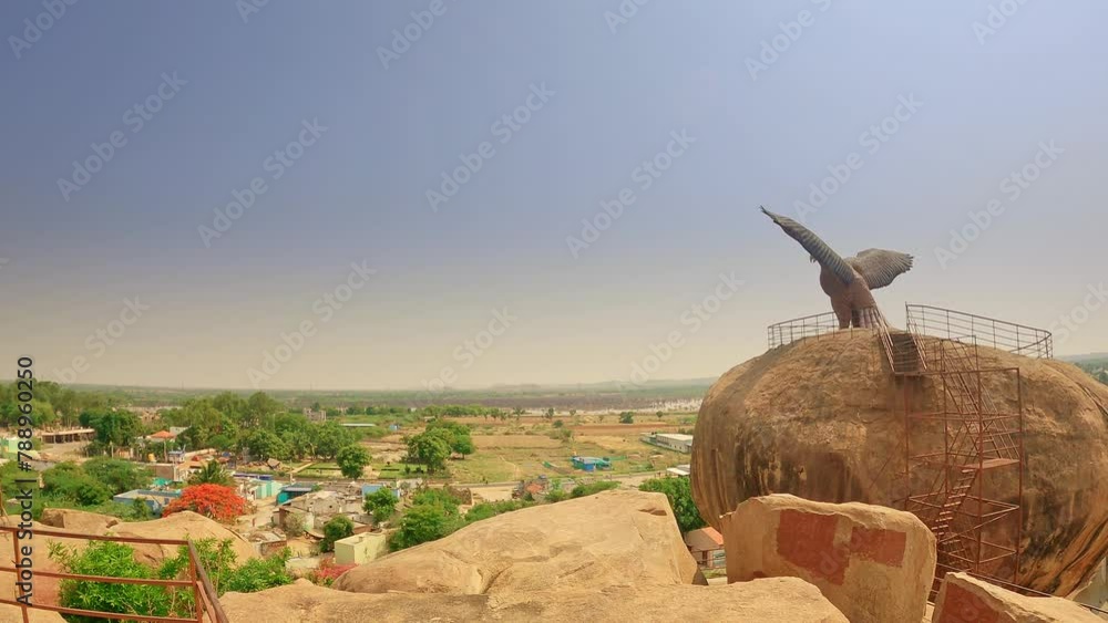 Sculpture of Jatayu (Eagle of Ramayana) with wings spread on huge rock ...