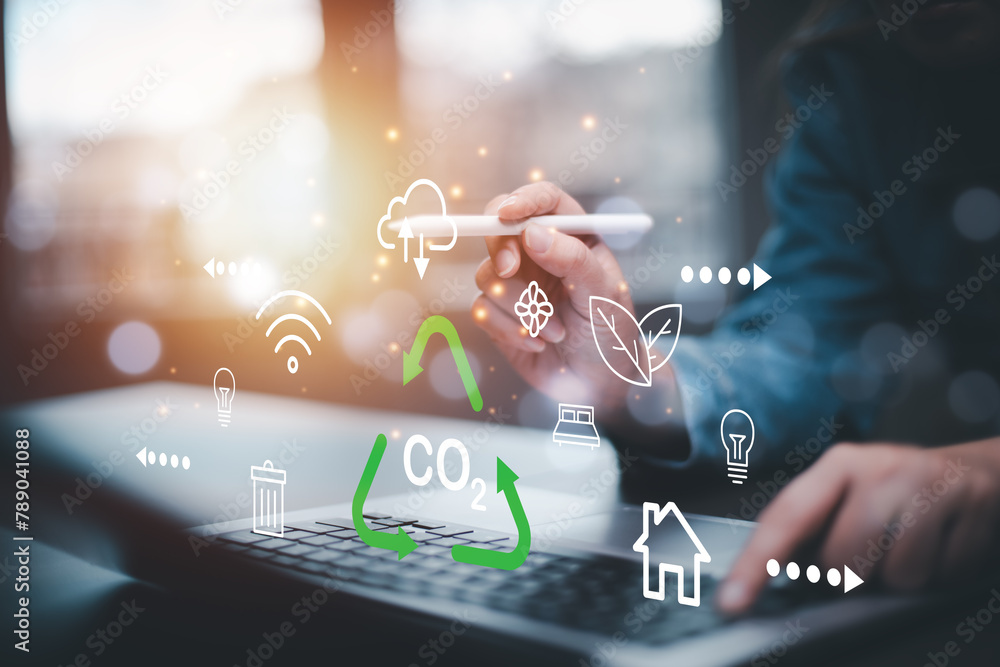 Businessman using laptops and touch recycle symbol with virtual modern ...
