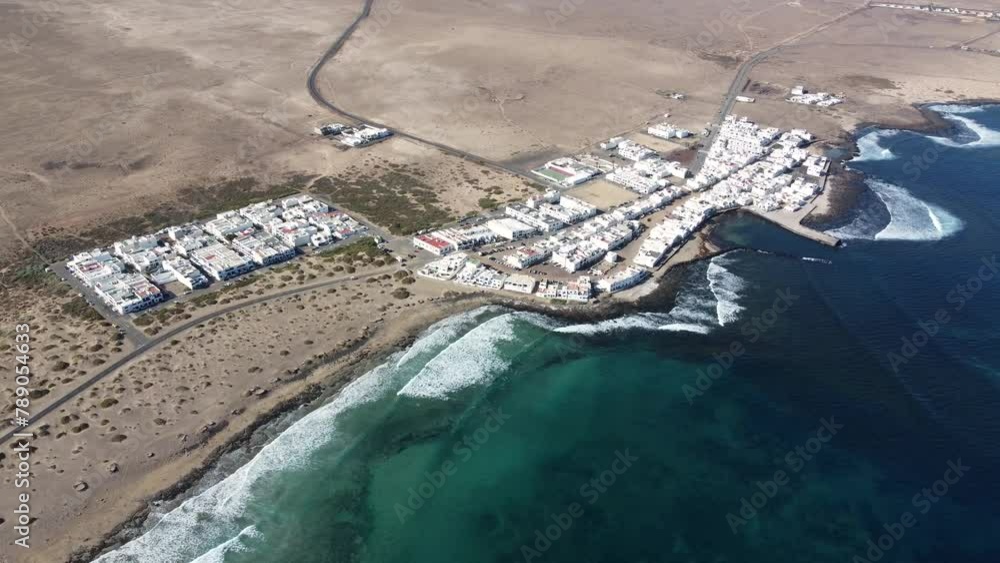 Video „High altitude aerial view of Caleta de Famara is town at ...
