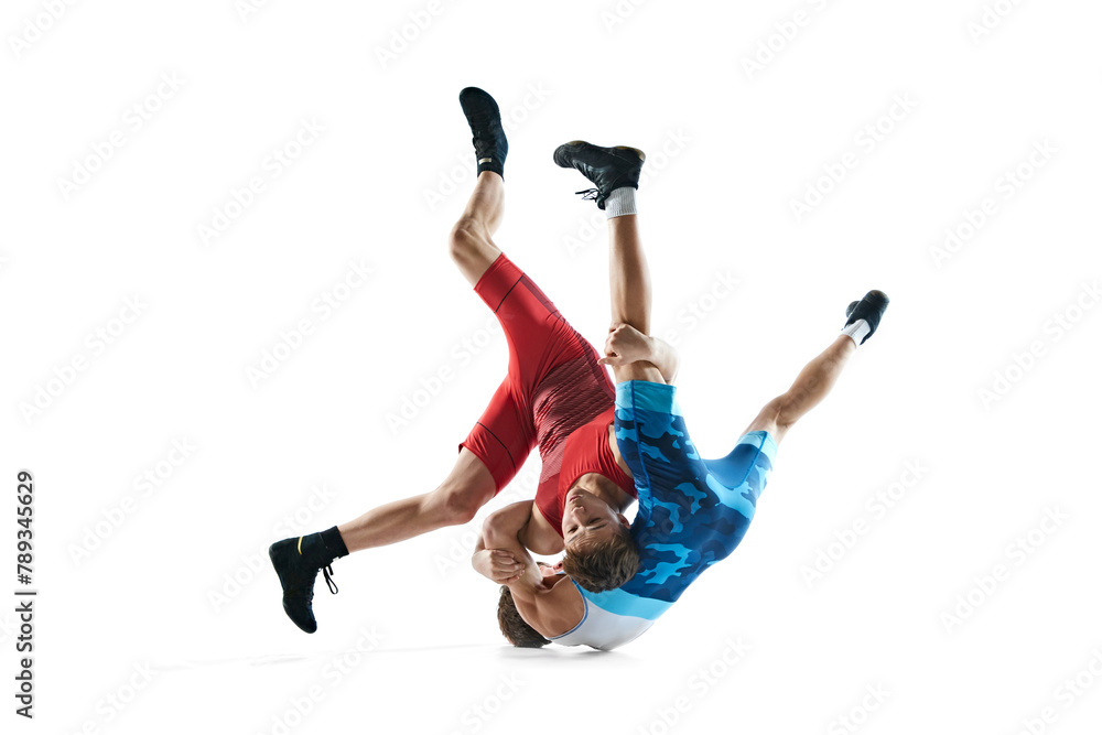 Wrestlers in action, young male competitors in motion, wrestling in ...