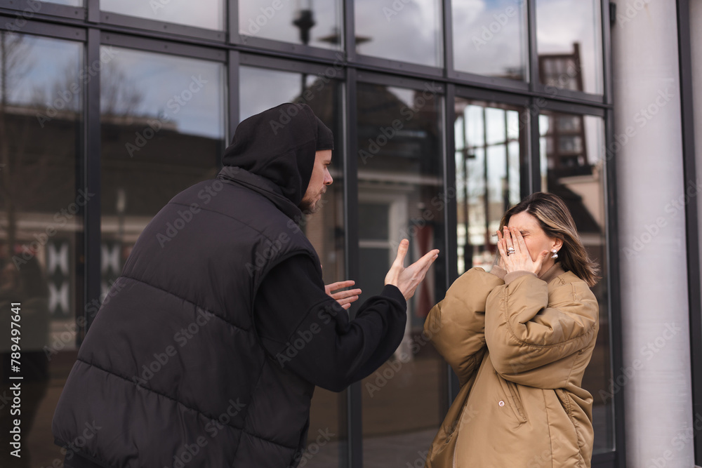 Young arguing sad couple two friends family man woman in casual clothes ...