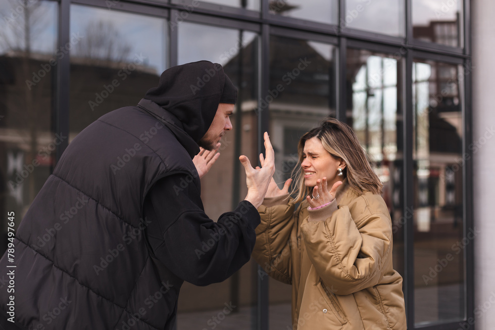 Young arguing sad couple two friends family man woman in casual clothes ...