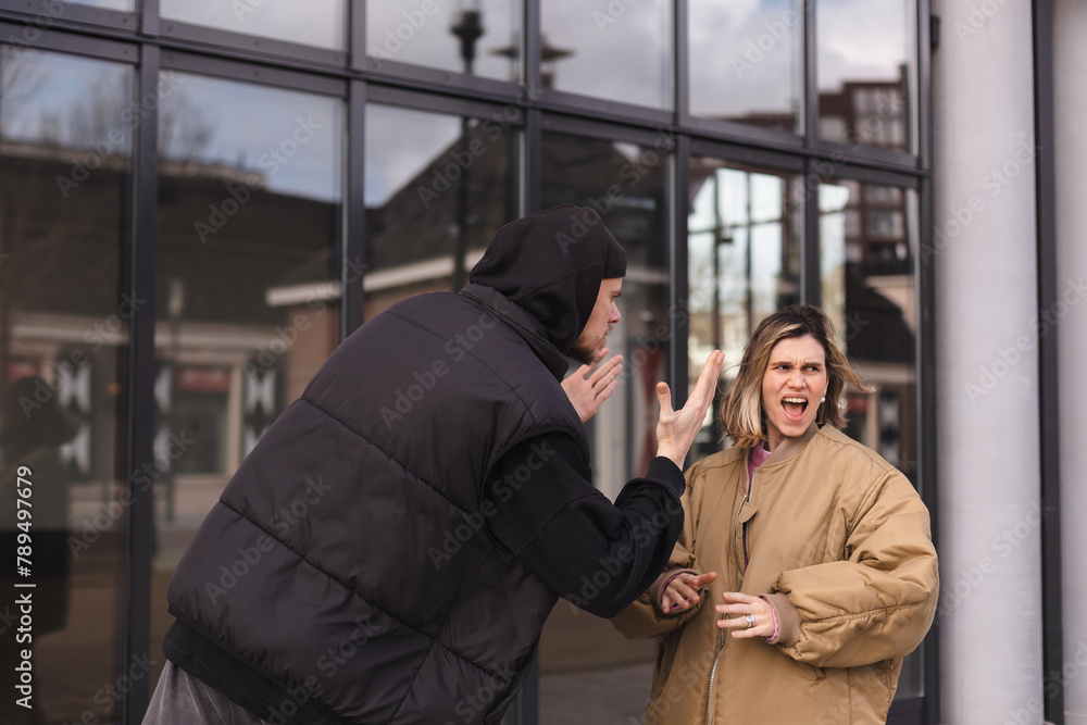 Young arguing sad couple two friends family man woman in casual clothes ...