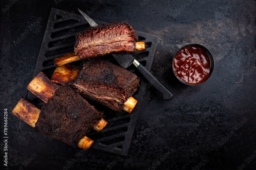 Traditional barbecue burnt chuck beef ribs marinated with spicy rub and ...