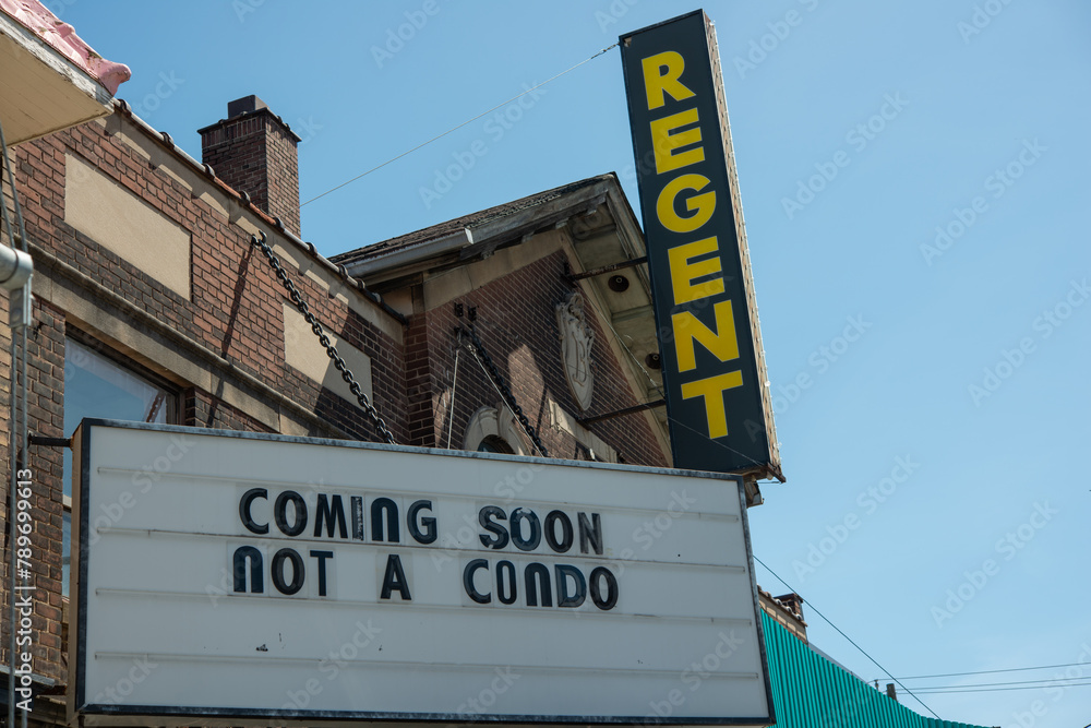 exterior projecting sign and marquee sign outside Regent Theatre, a ...