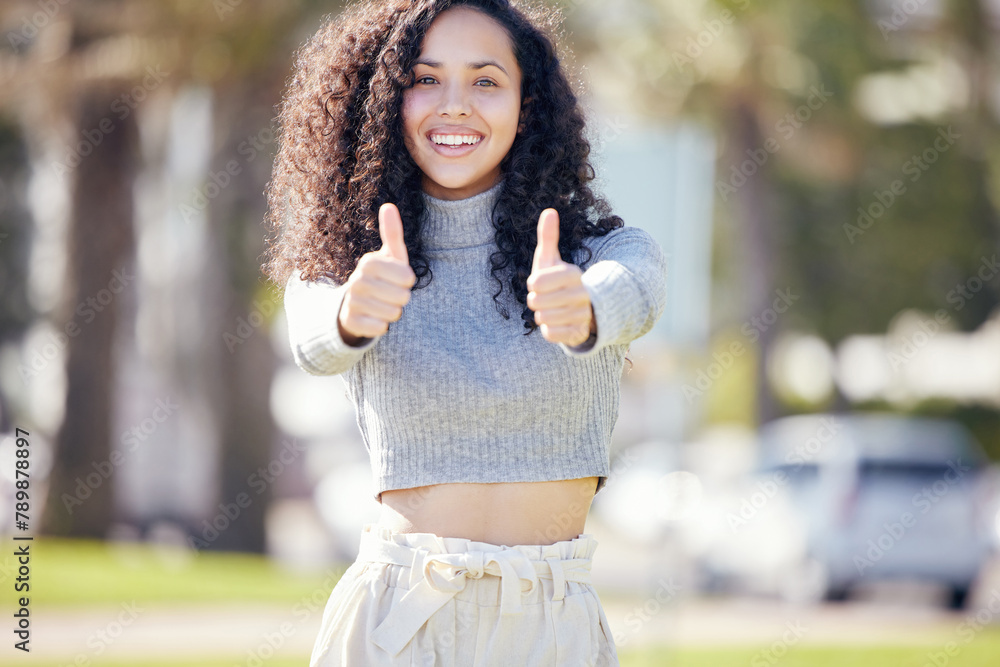 Portrait, thumbs up and woman in park, smile and sunshine with ...