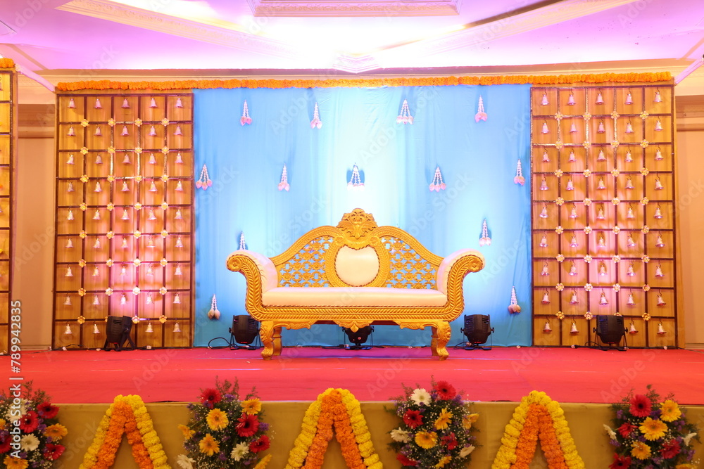 Indian style stage decoration with blue backdrop decorated with lotus ...