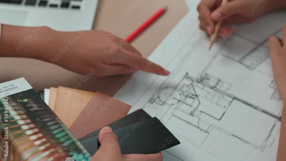 Slow motion interior designer using architectural equipment draw a ...
