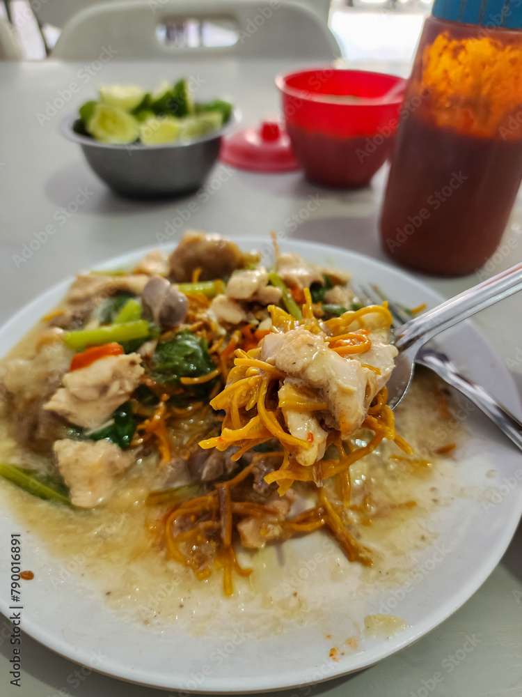 Mie Kering or Mie Titi is one of the most famous Makassar dishes. Mie ...
