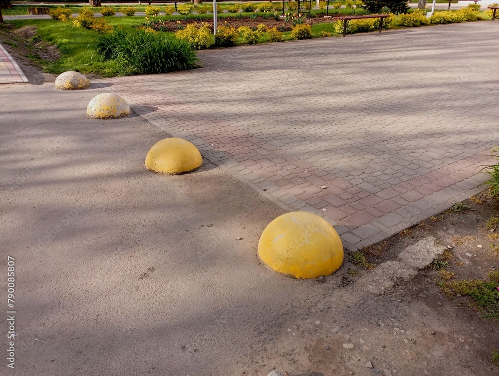 Concrete hemispherical barricades for the movement of cars on the ...