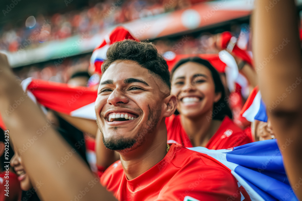 Costa Rican football soccer fans in a stadium supporting the national ...