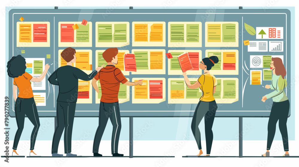 Team members moving cards on large kanban board for agile project ...