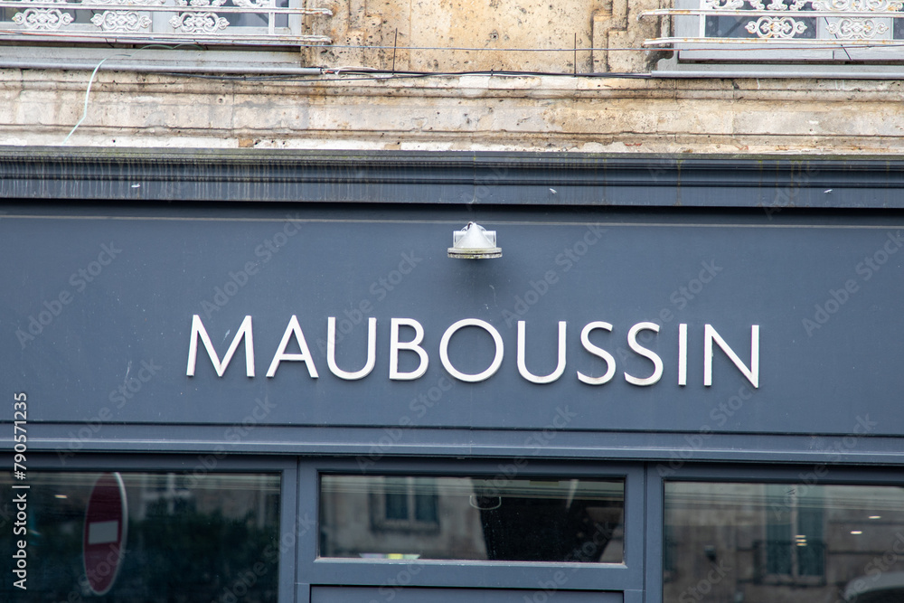 Mauboussin store sign text and logo chain front of facade fashion shop ...