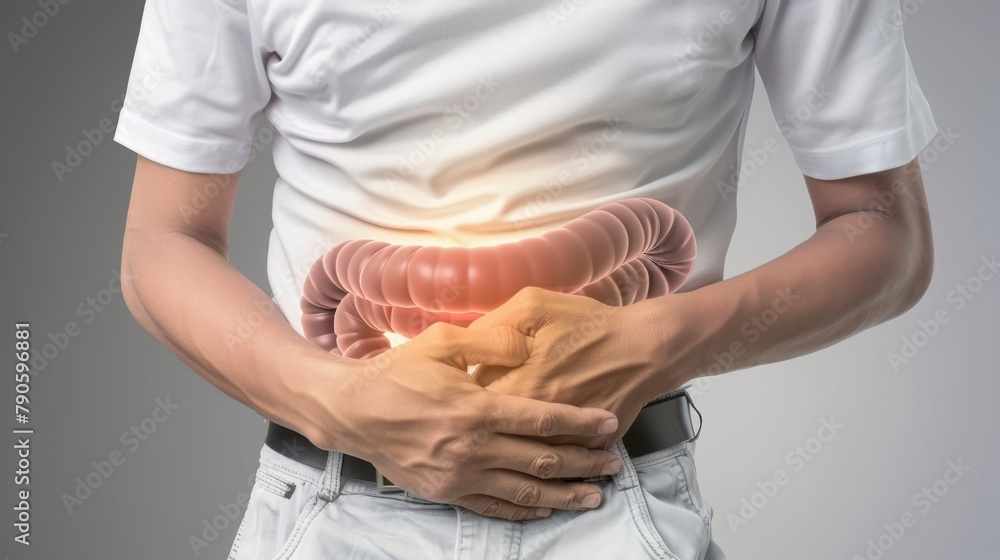The photo of large intestine is on the man's body against gray ...
