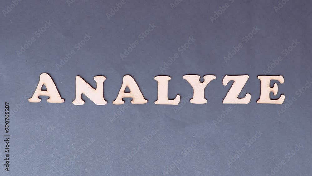Problem Solving Concept 'Analyze' Spelling in Wooden Alphabet Letters ...