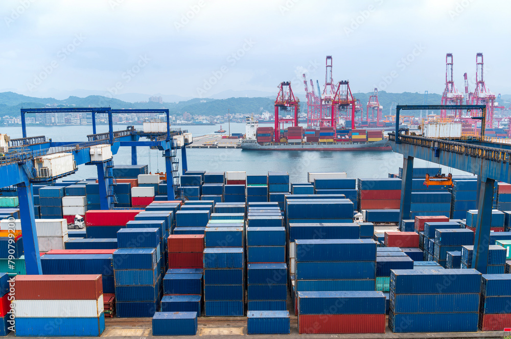 Port container cranes loading with multi-colored containers for ...