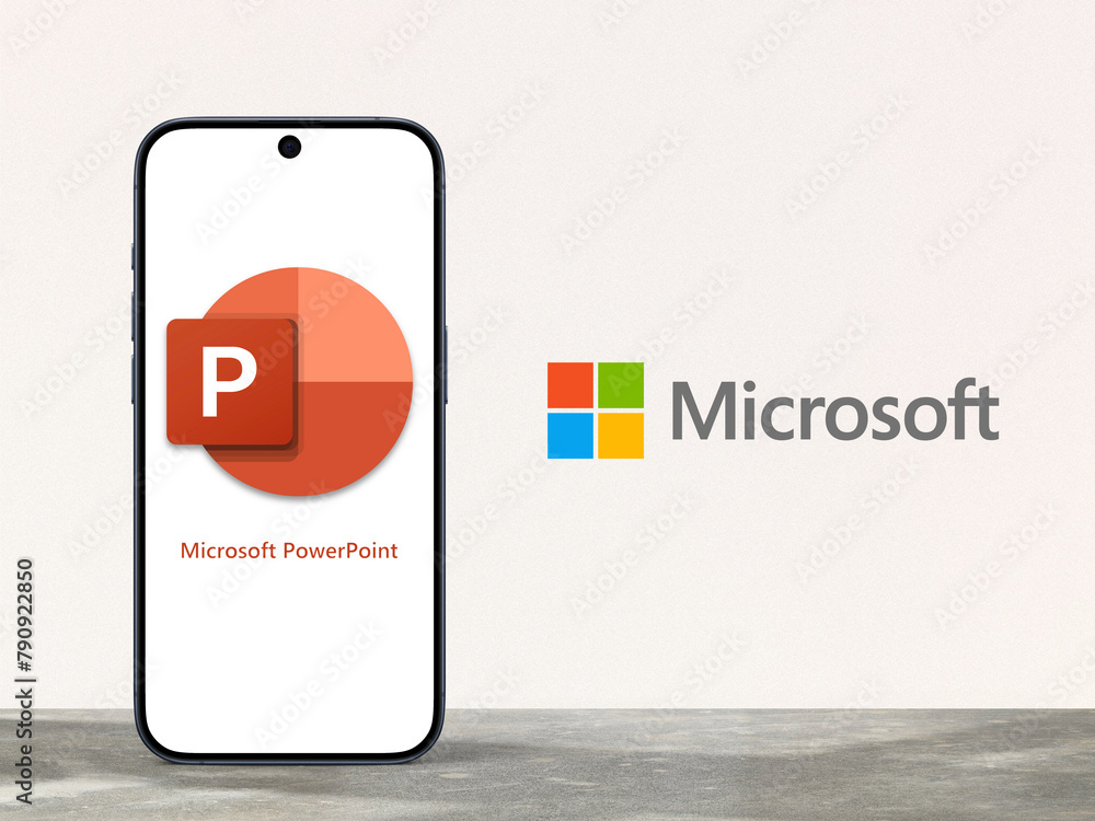 Microsoft PowerPoint logo displayed on a modern smartphone standing on ...