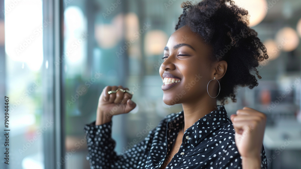 Winner. Happy black female entrepreneur winning new business client at ...