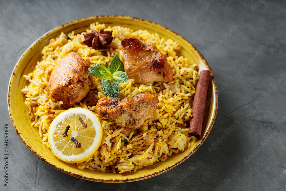 Chicken Biryani with Basmati Rice on Yellow Plate, Popular Indian and ...