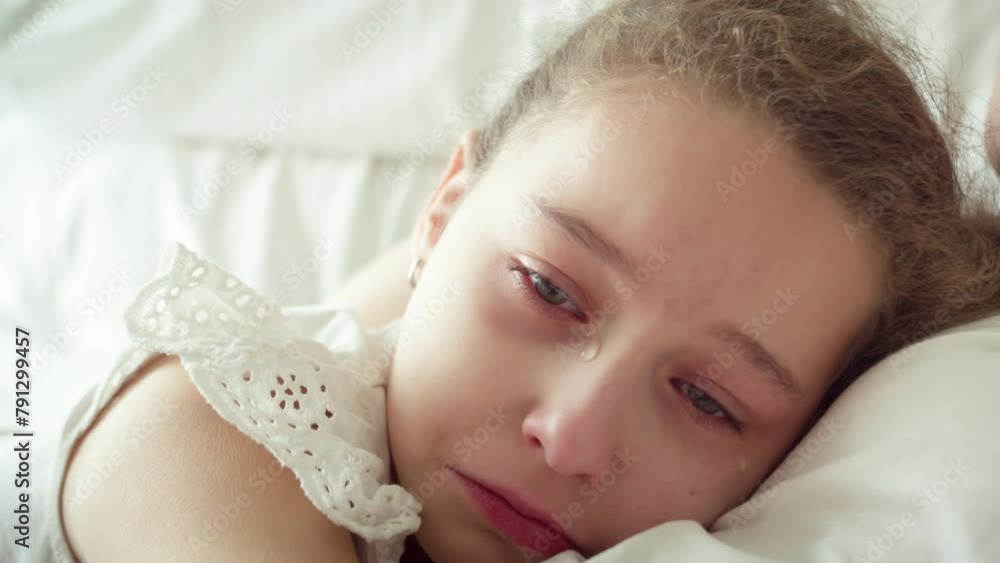 Mom takes pity on her daughter. Portrait upset child little girl with ...