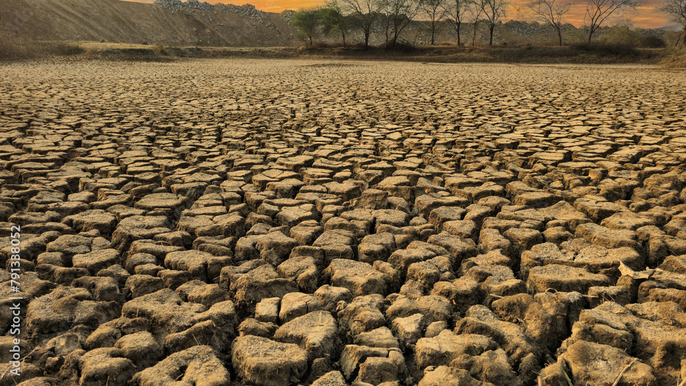 Dry creaked soil land. background and texture of dry land. climate ...