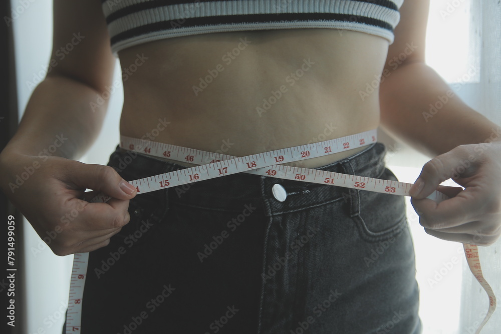 Women body fat belly. Obese woman hand holding excessive belly fat ...