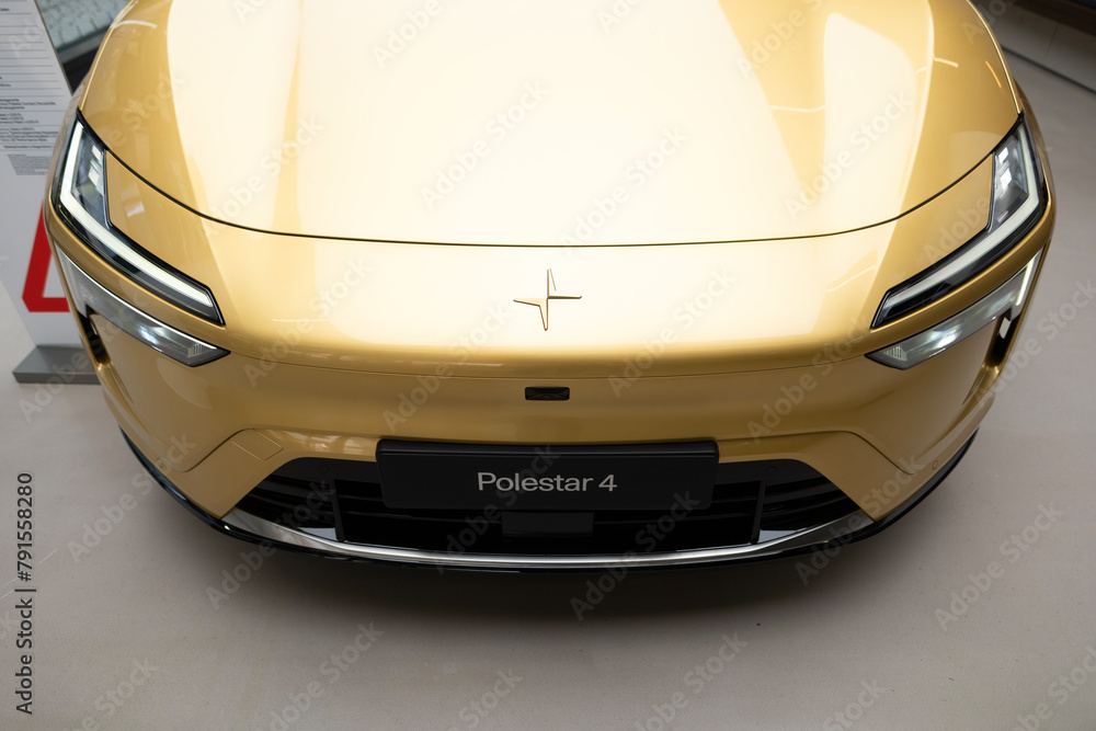 Shiny golden car Polestar 4 upcoming all-electric SUV coupe by Polestar ...