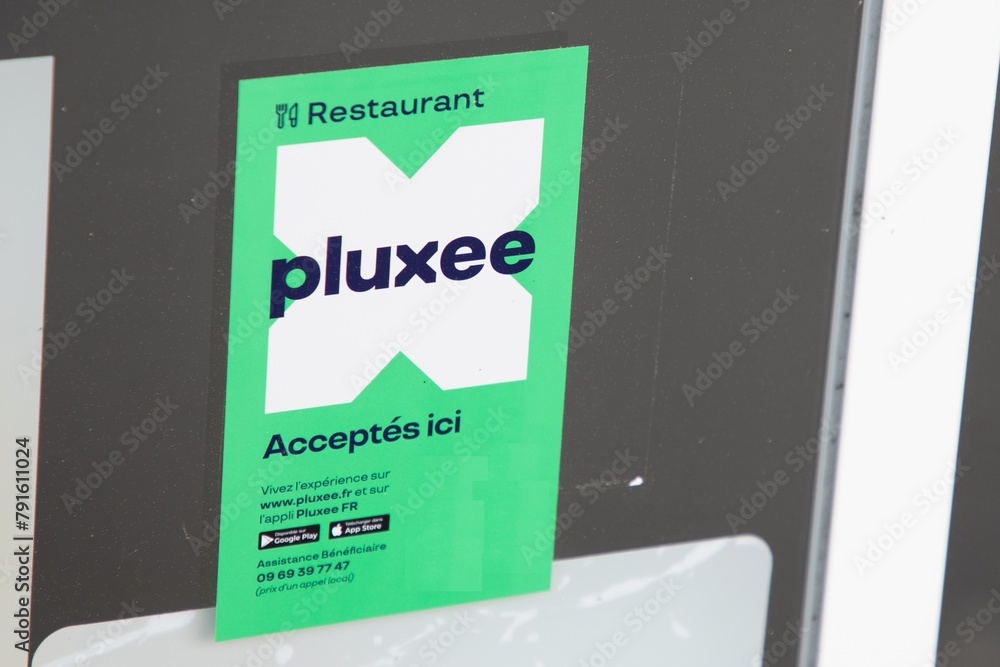 pluxee sodexo cross brand logo and text sign front of bar door window ...