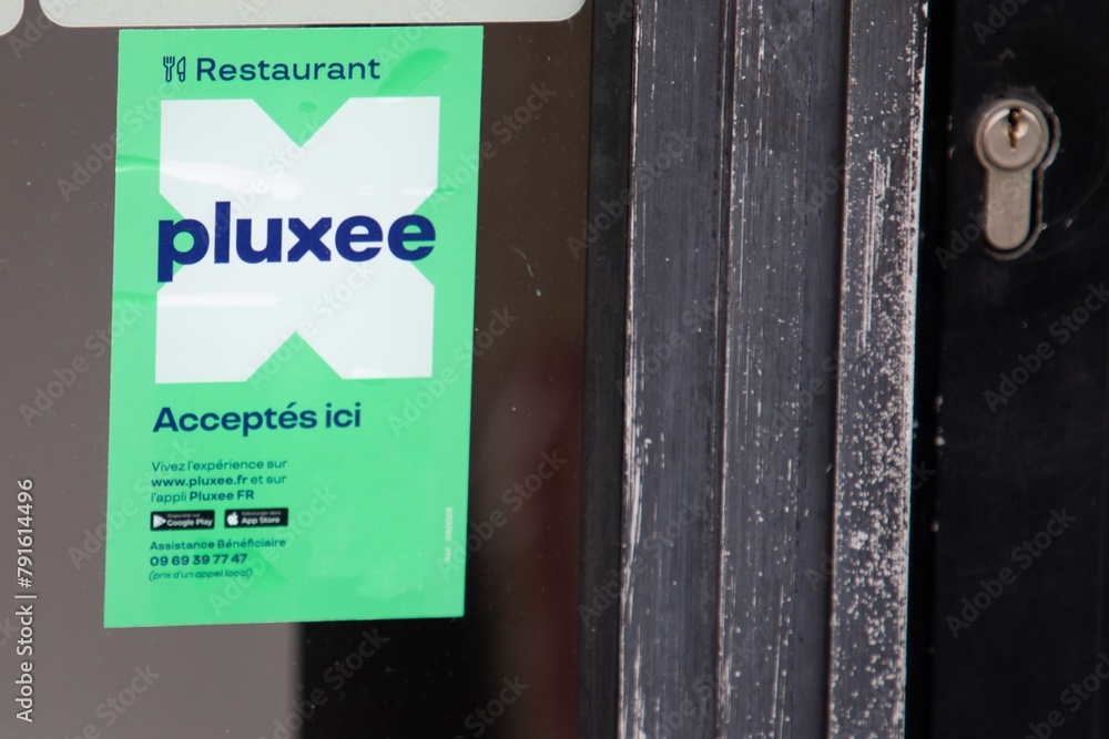 pluxee sodexo brand logo and text sign front bar door window facade ...