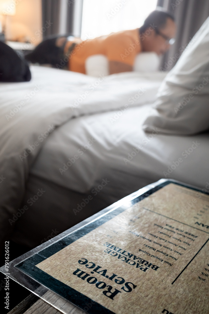 Room service menu at hotel room placed at bedside table Room service ...