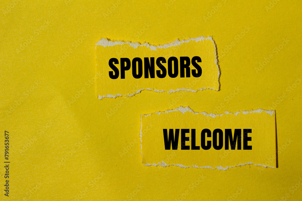 Sponsors welcome words written on ripped yellow paper pieces with ...