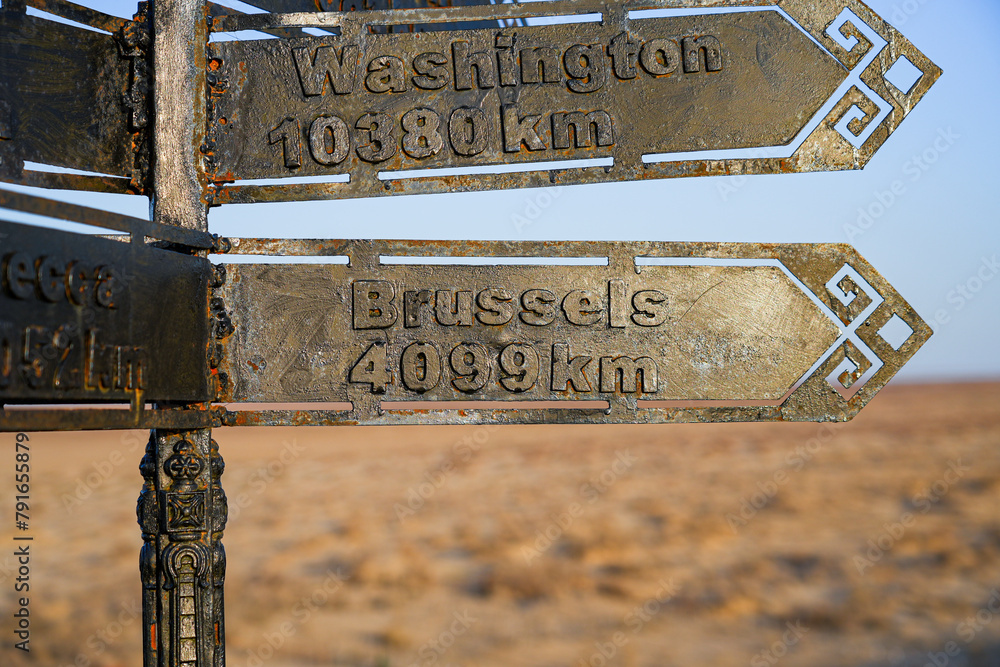 Multiple destinations orientation signpost located on an overlook above ...