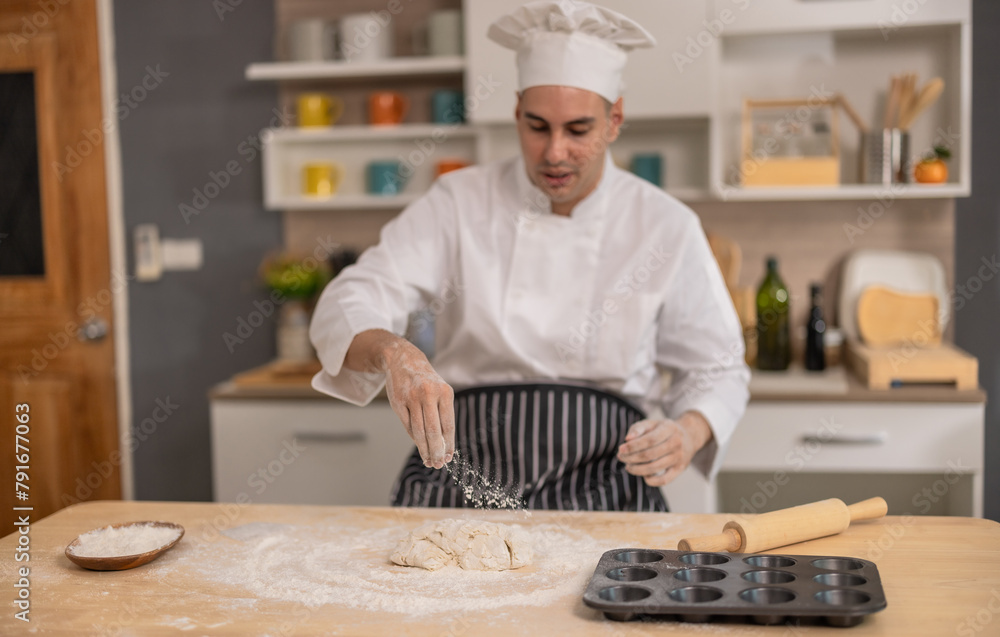 Professional chef kneads dough with expertise. Art of bread-making in a ...