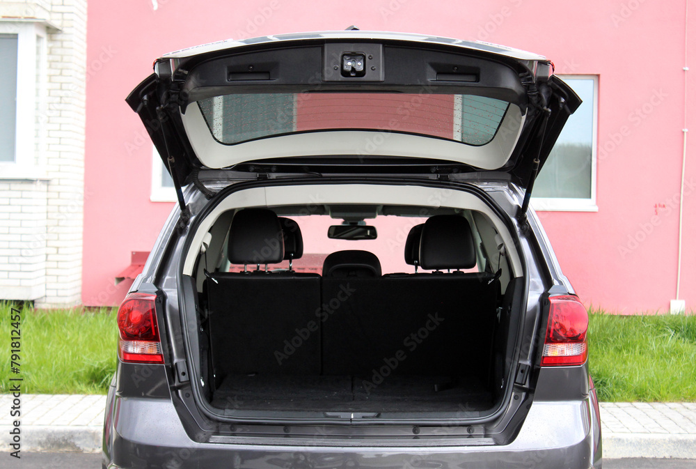 Modern wagon car open trunk. Car boot is open. Open tailgate on a ...