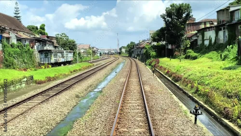 Motion Video. HD. View of train moving on its railway with pebbles ...