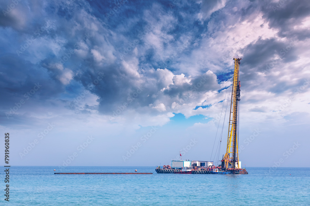 Pile and pile driving for pier installation. During pile driving, steel ...