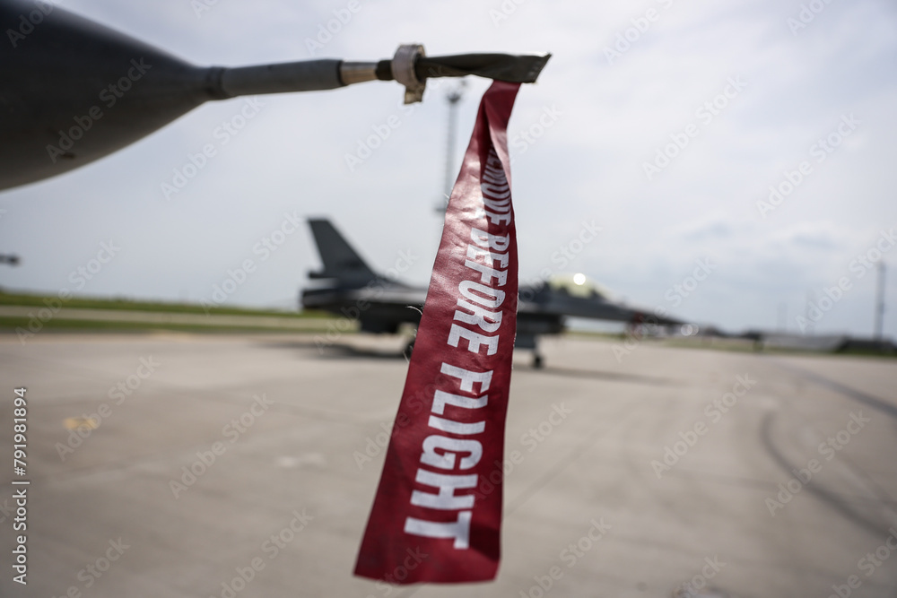 Remove before flight ribbon safety on a fighter jet Stock Photo | Adobe ...