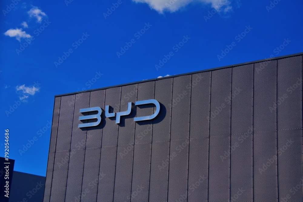April 20th 2024 Florence, Italy. Pole billboard with logo BYD on blue ...