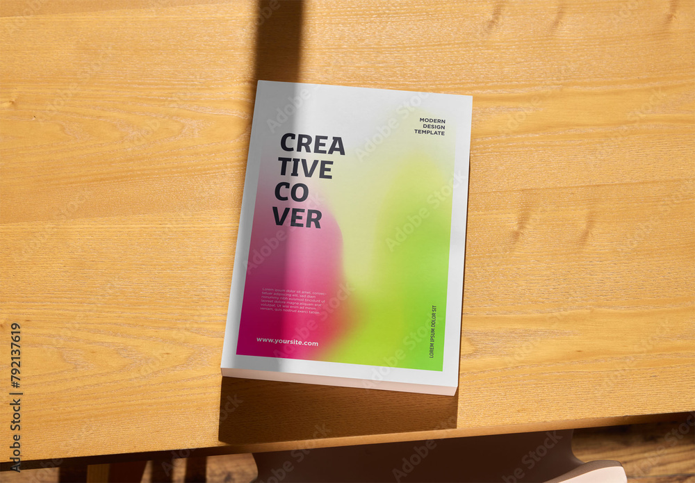 Mockup of vertical A4 paperback magazine, customizable front cover ...