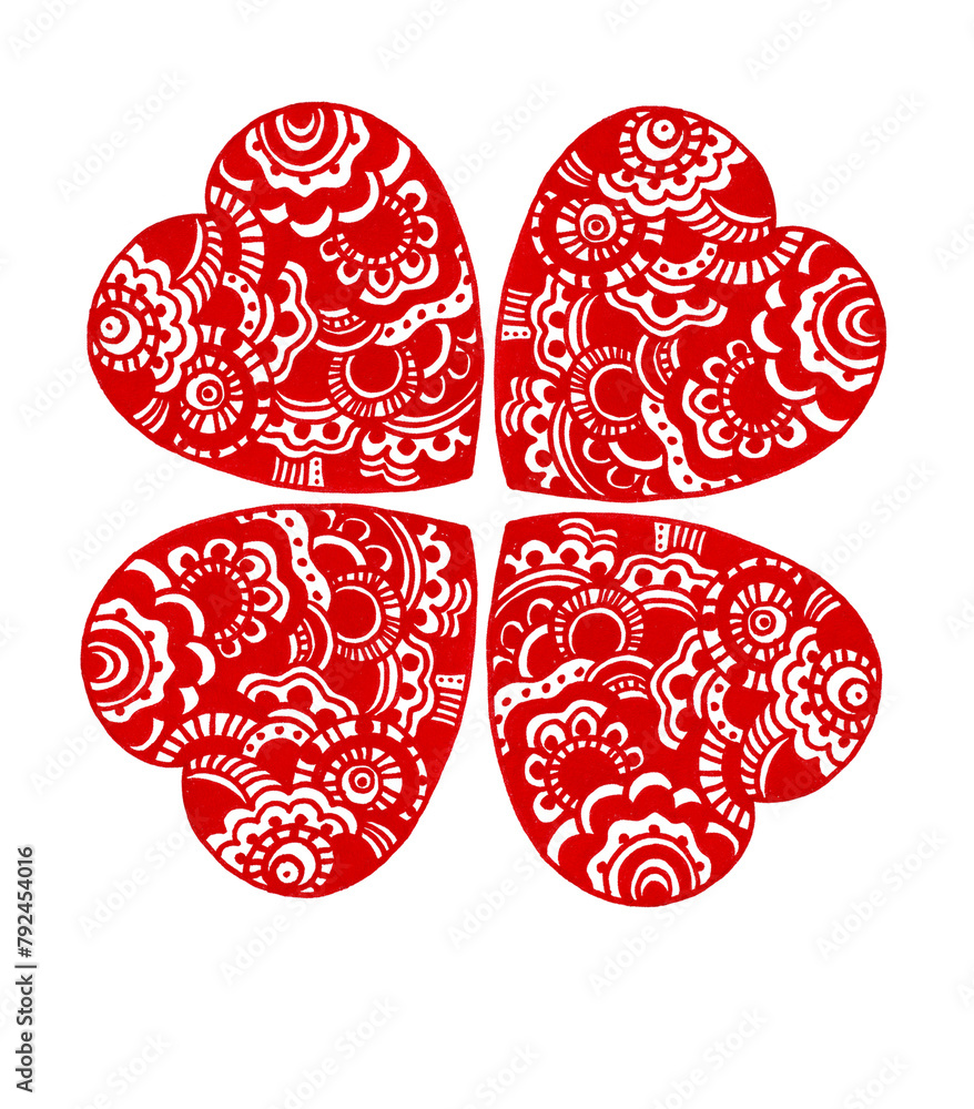 A clover leaf is filled with red decor on a white background. The ...