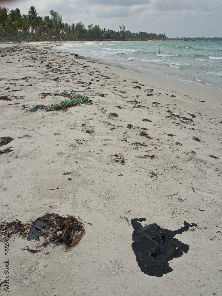 Tar pollution on beach due to oil spillages from shipping in Bintan ...