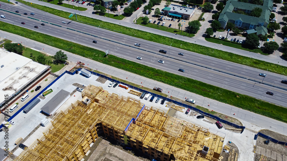 Interstate 35 highway and large apartment complex under construction ...