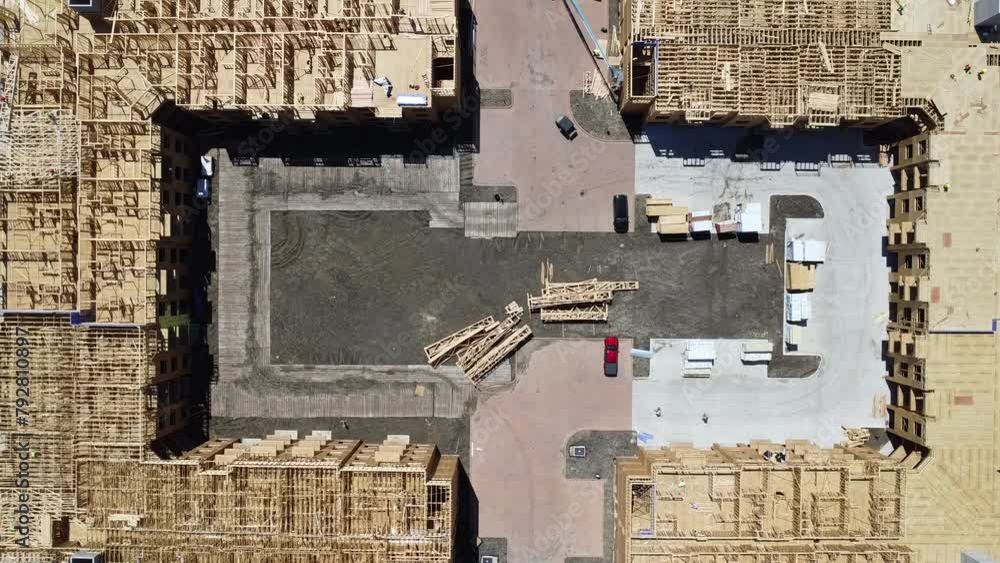 Crane and construction machine at courtyard open typology multi-story ...