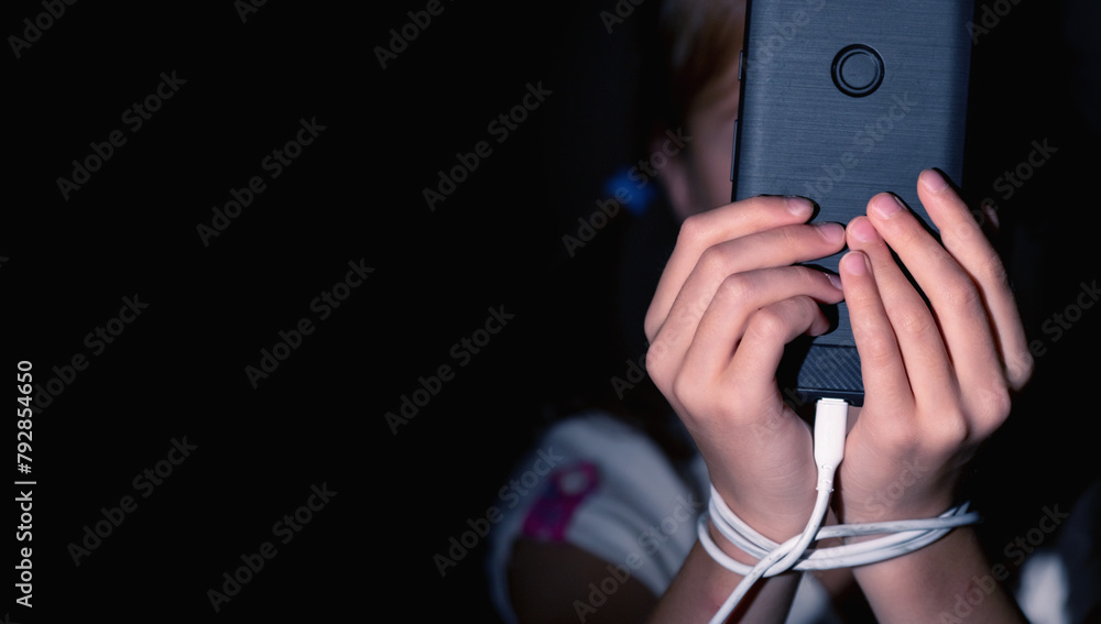 Young girl at night communicates on Internet. Child gadget addiction ...