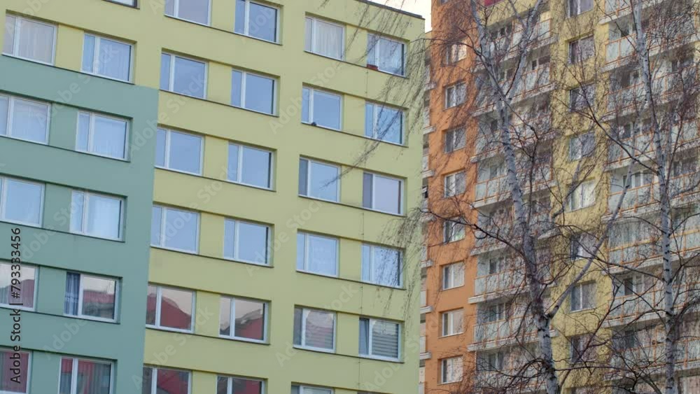 Rows of windows adorning facades at spring. Residential area with ...