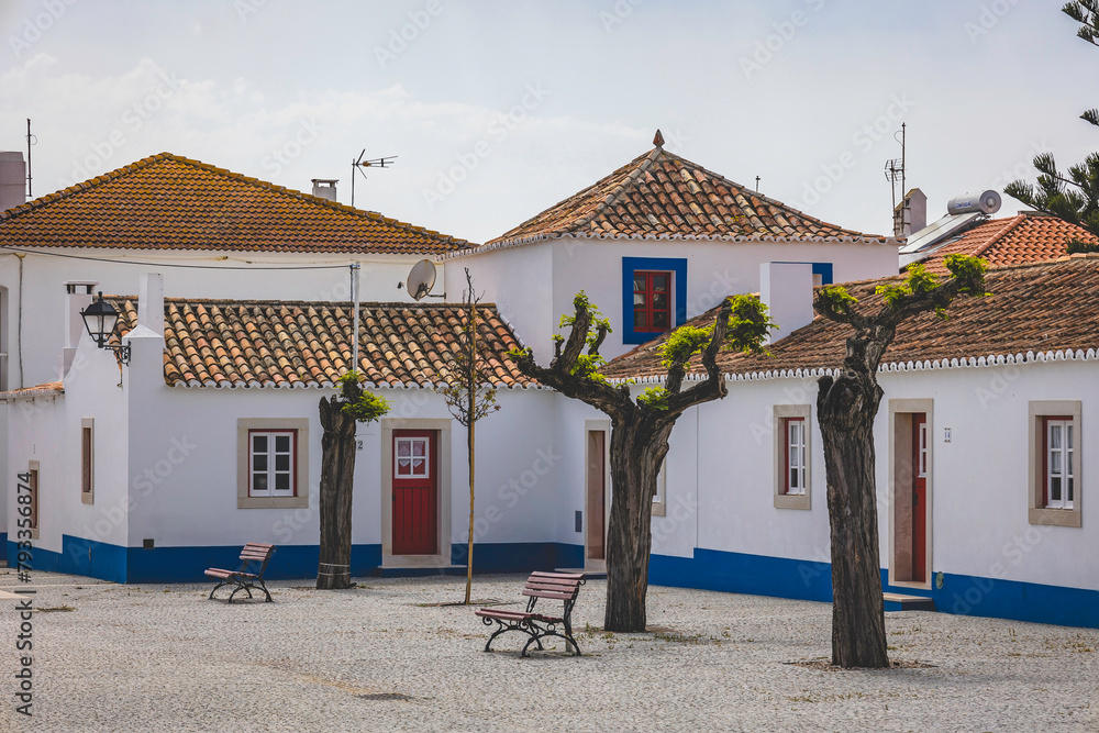City of Porto Covo with traditional Alentejo houses painted white with ...