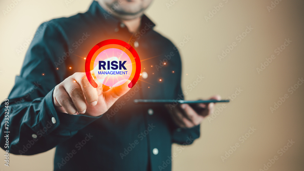 Foto de Risk management concept. Businessman touches risk management ...