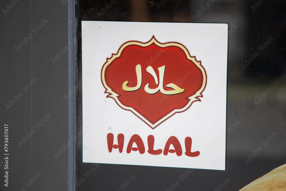 Halal text sign arab in windows facade shop food boutique Stock Photo ...