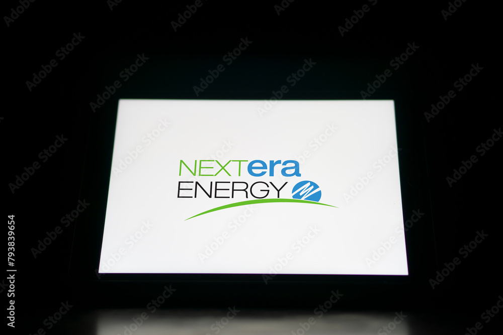 Dhaka, Bangladesh- 24 Apr 2024: NextEra Energy logo is displayed on ipad. Stock Photo | Adobe Stock